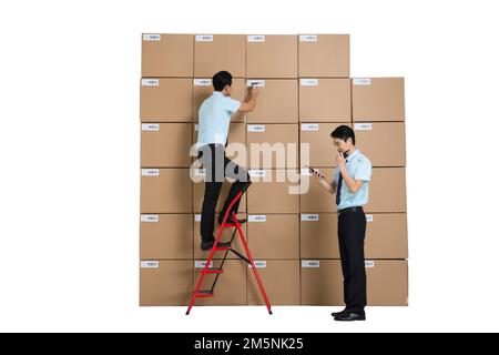 Scan cargo logistics warehouse staff Stock Photo - Alamy