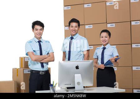 Logistics warehouse staff use office computer Stock Photo - Alamy