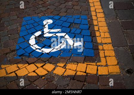 Reserved for wheelchair, severely disabled, marking on pavement ...