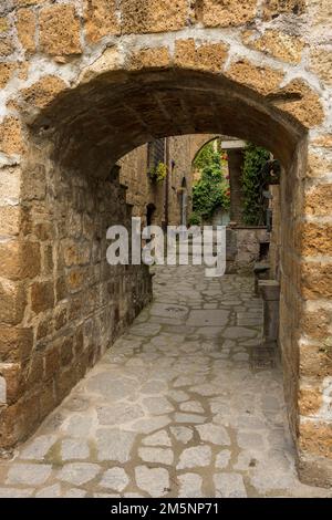 Ancient tufa buildings in the hilltop village of Civita di Bagnoregio ...