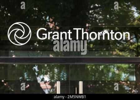 Grant Thornton logo and company name on top of skyscraper office ...