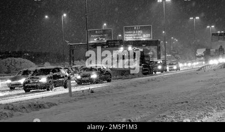 Heavy snow falling on the M27 at night with the gritting vehicles ...