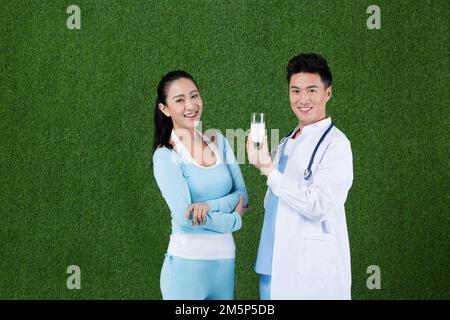Grass male doctors to patients with milk Stock Photo - Alamy
