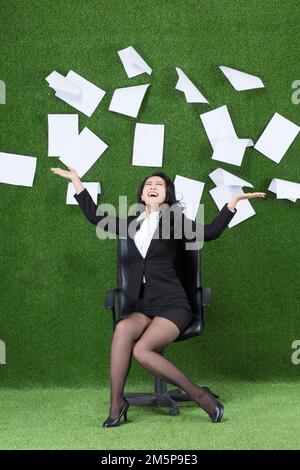 Ms grass business paper thrown into the air Stock Photo - Alamy