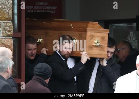 The coffin of Patrick Rogers is carried from his funeral service at St ...