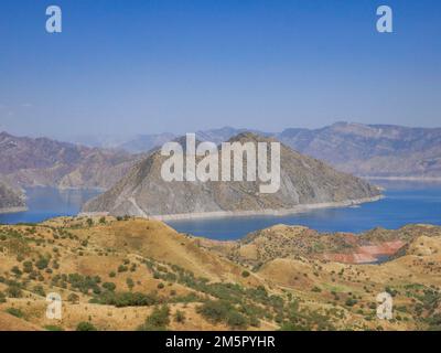 Scenic mountain landscape view of Nurek dam lake on Vakhsh river ...