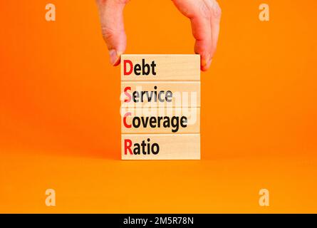 DSCR debt service coverage ratio symbol. Concept words DSCR debt ...