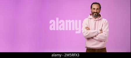 Portrait cool bearded mature grandad trying stay stylish urban trends ...