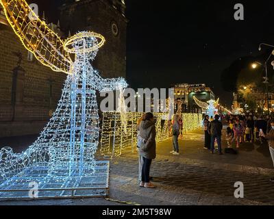 Puebla, USA. 11th Dec, 2022. Pilgrims on bicycle or in cars and trucks ...