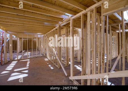 There are beams of wood stick framing to framework new house in ...