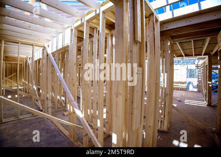 There are beams of wood stick framing to framework new house in ...