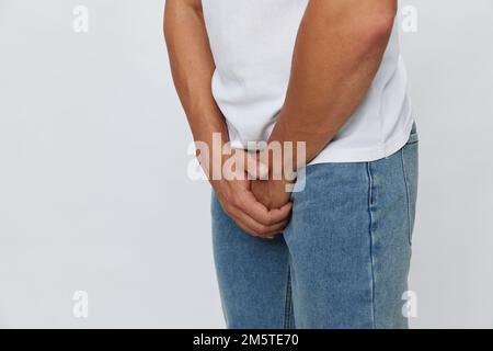 Man groin pain problems with potency and urination, urolithiasis, in ...