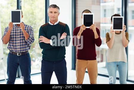 Team of business men and women covering one eye with hand with ...