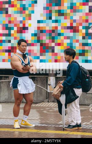 A muscular man in maid outfit Stock Photo - Alamy