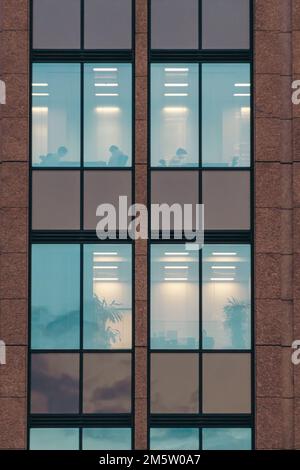 Japanese corporate employees working in office buildings Stock Photo ...