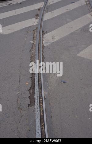 Very worn and damaged tram lines permanent way of the Bucharest tram ...