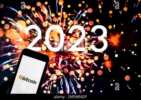 In this photo illustration Bitcoin logo is displayed on a smartphone ...