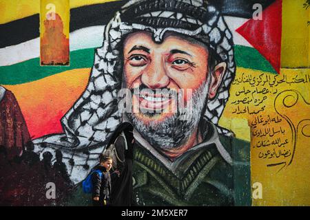 Gaza, Palestine. 31st Dec, 2022. Palestinians attend a rally marking ...