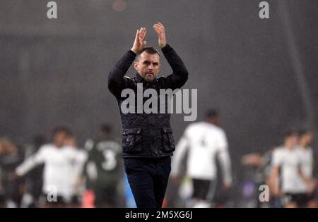 Southampton manager Nathan Jones applauds the fans after the Emirates ...