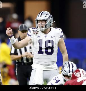 Kansas State quarterback Will Howard throws during the first half of an ...
