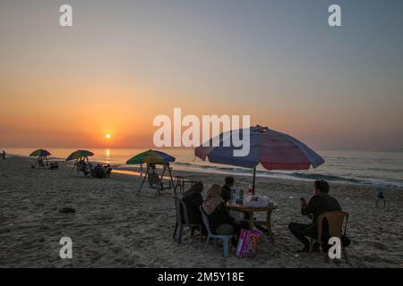 Gaza, Palestine. 31st Dec, 2022. Palestinians light a torch during the ...