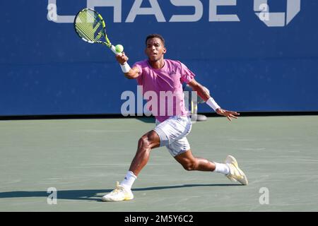 Canadian tennis player Felix Auger-Aliassime (CAN), playing a service shot at the 2025 Dubai ...