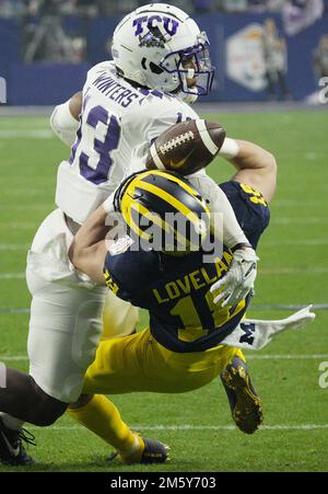 Michigan tight end Colston Loveland watches as prospects run drills at ...