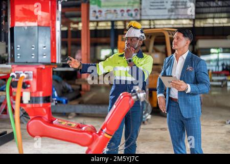 Engineer customer service explain introduction of new design robotic ...