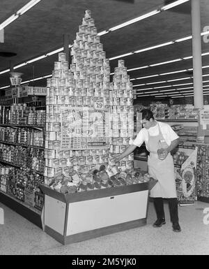Stacks of canned goods are shown in a Southern California grocery store ...