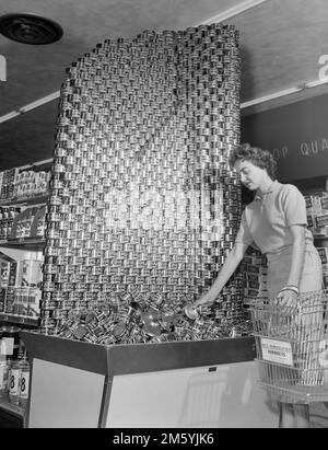 Stacks of canned goods are shown in a Southern California grocery store ...