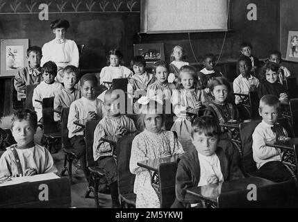 Vintage classroom of school children at desks circa 1890s Stock Photo ...