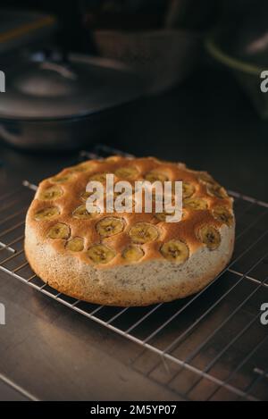 A homemade baked round banana cake with sugar Stock Photo - Alamy