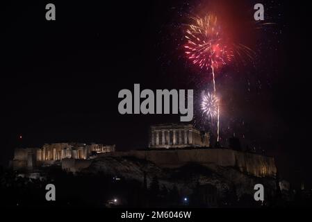 Athens, Greece. 1st Jan, 2023. Fireworks explode by the Acropolis ...