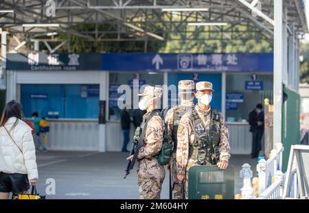 BEIHAI, CHINA - JANUARY 1, 2023 - Police officers patrol near a railway ...
