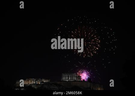 Athens, Greece. 1st Jan, 2023. Fireworks explode by the Acropolis ...