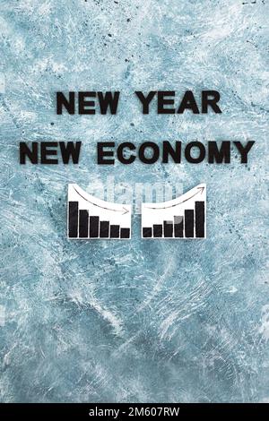 new year new economy text with graphs showing growth stats going down ...