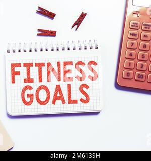 Sign displaying Fitness Goals. Business overview Loose fat Build muscle ...