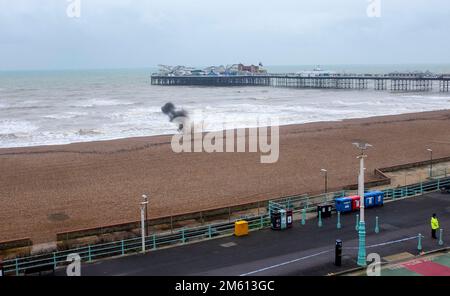 Brighton UK 1st January 2023 - A WW2 shell washed up on beach near the ...