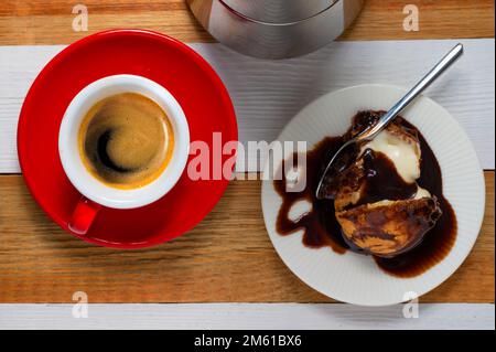 Profiteroles and espresso a top view shot Stock Photo - Alamy