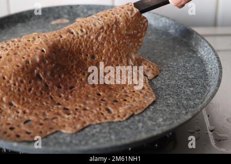 Instant Finger Millet Dosa, made with finger millet flour, curd and ...
