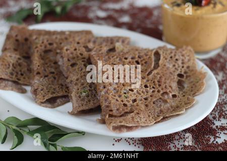 Instant Finger Millet Dosa, made with finger millet flour, curd and ...
