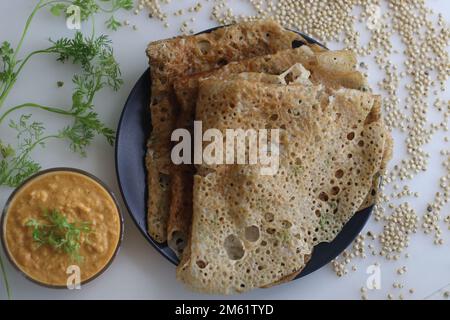 Crispy, golden Instant Jowar dosa. Quick and easy Indian breakfast dish ...