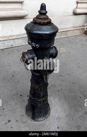 A Fire Hydrant, Waterplug, or Firecock on City Street, Red Steel Pipe ...