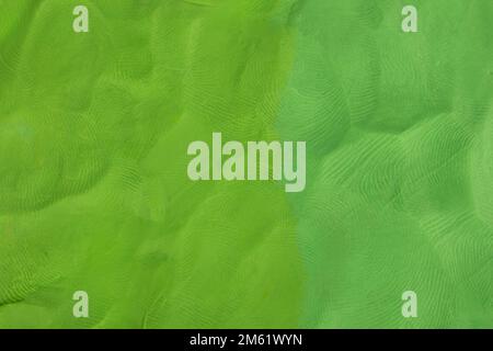 red Plasticine textured background Stock Photo - Alamy