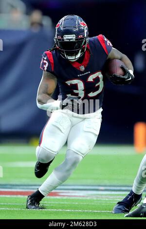 Houston Texans running back Dare Ogunbowale (33) runs the ball against ...