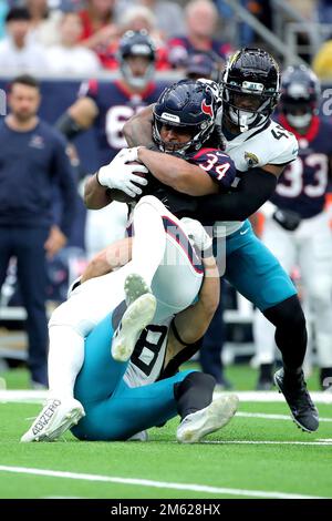 Jacksonville Jaguars defensive end K'Lavon Chaisson (45) lines up on ...