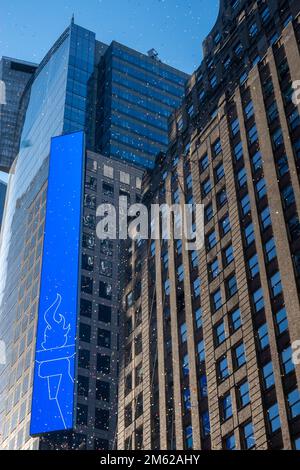 Brightly colored confetti pieces swirl over Times Square on New Year's ...