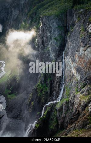 Waterfall Voringfossen and view over the landscape and canyon of ...