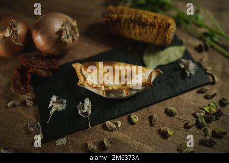 From above of appetizing argentinian empanadas served on flat plate on ...