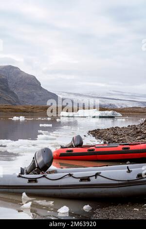 Modern motorboat on lake near city Stock Photo - Alamy